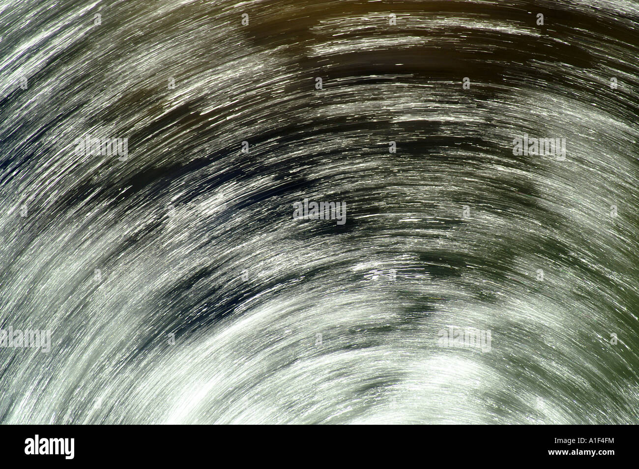 Manually - lens rotated - image of arc forming revolving lines Stock ...
