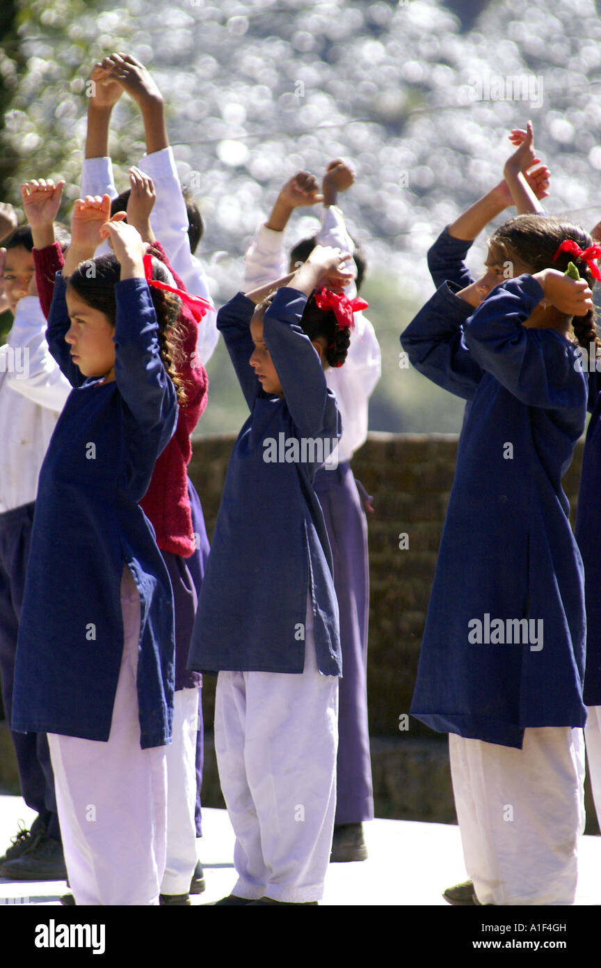 Pupils of indian primary school exercising outdoors Stock Photo - Alamy