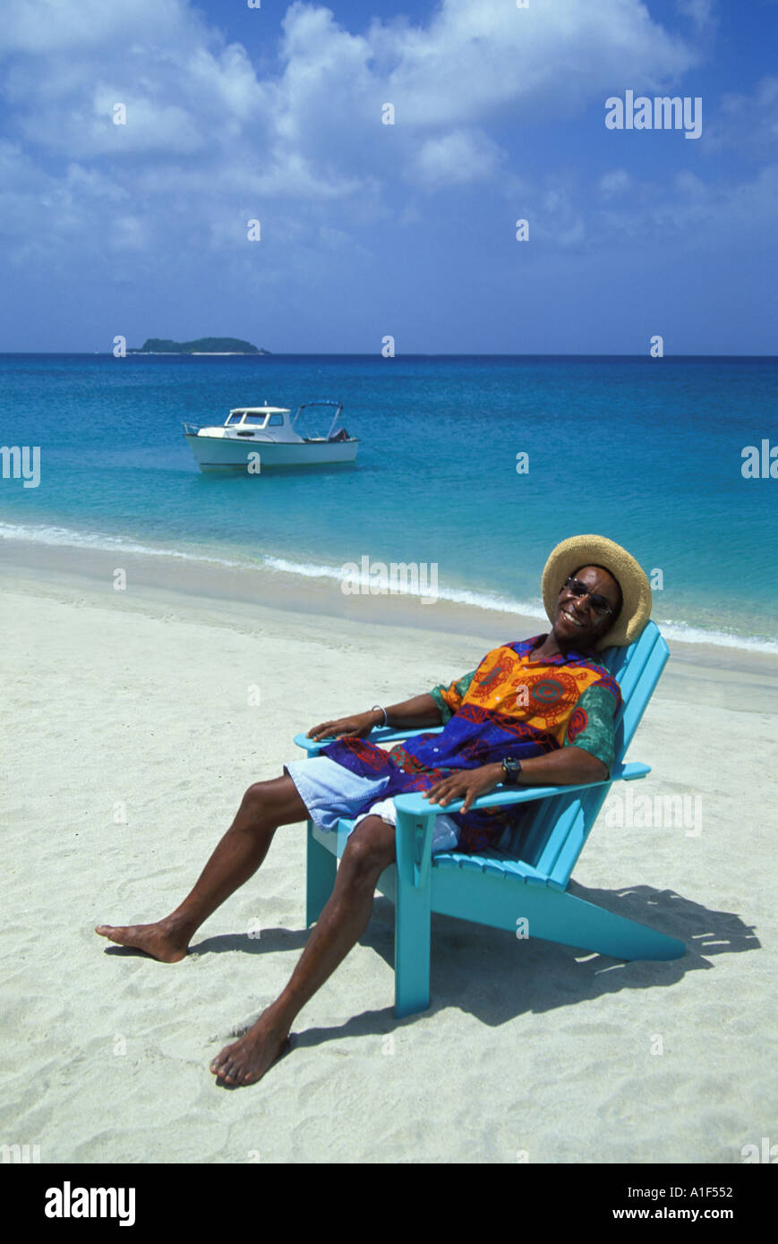 Relaxing on a beach Stock Photo - Alamy
