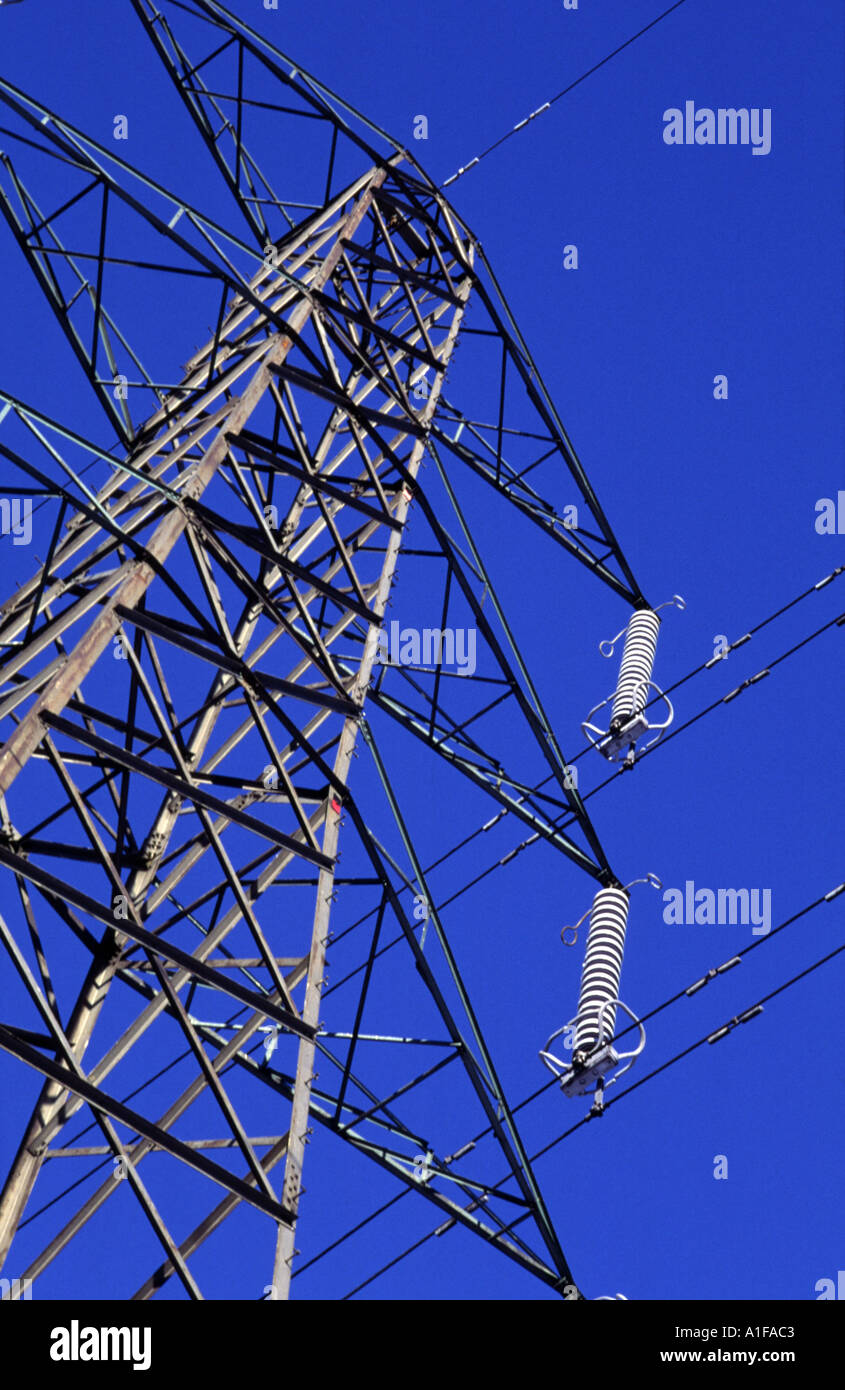 Electricity pylon viewed from below with deep blue sky Stock Photo - Alamy