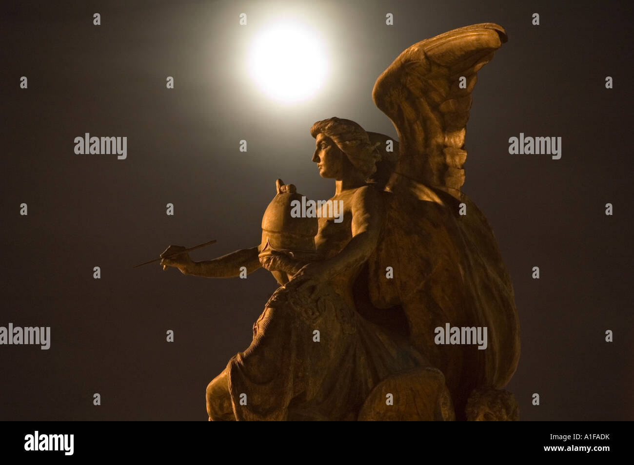 Moon light over angel statue of Victor Emmanuel monument in Piazza ...
