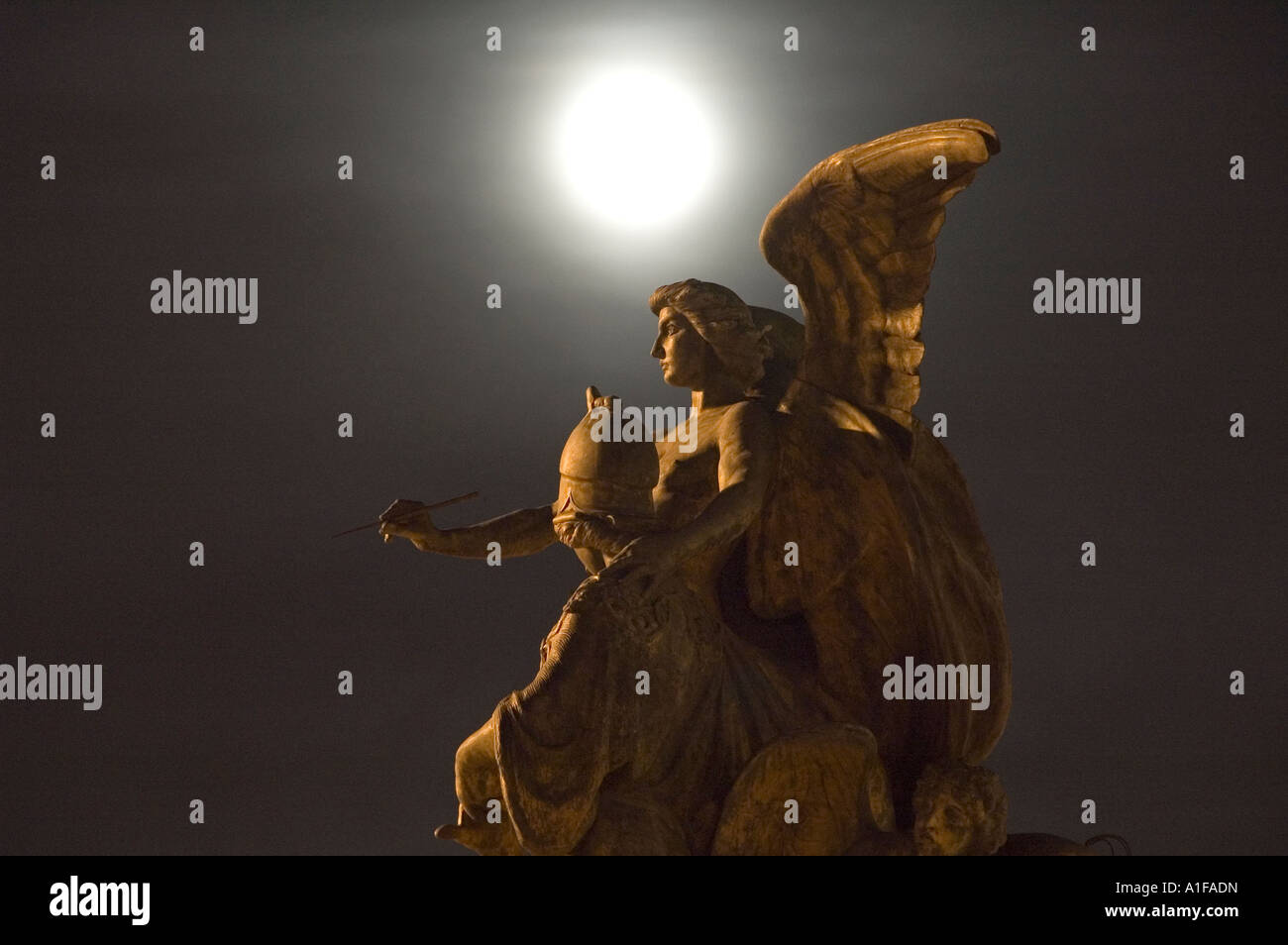 Moon light over angel statue of Victor Emmanuel monument in Piazza ...