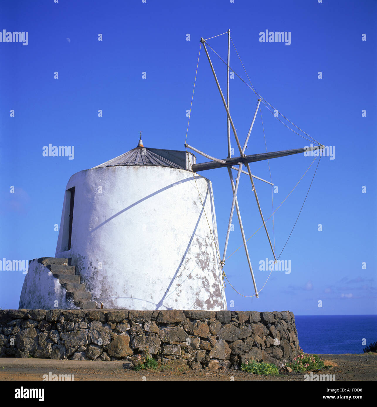 Windmill on the coast of Corvo in the Azores Portugal Atlantic Ocean D ...