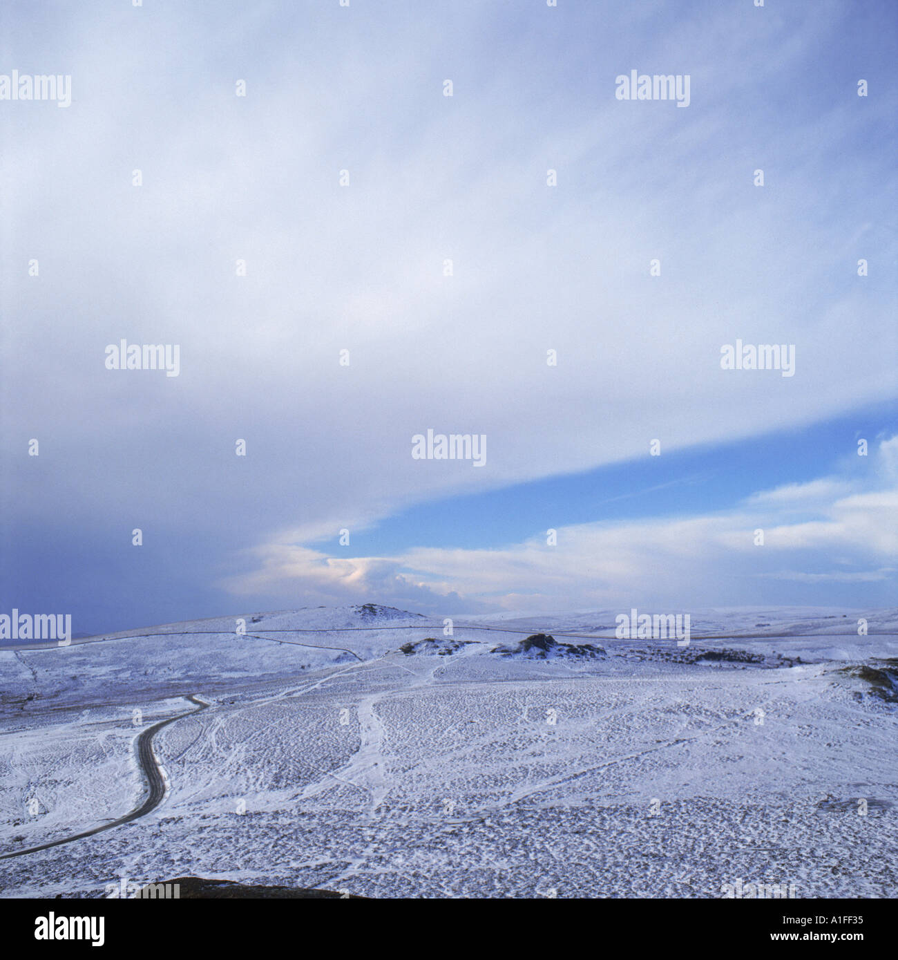 Cumulonimbus clouds bring snow squalls to Haytor Rocks Dartmoor Devon ...