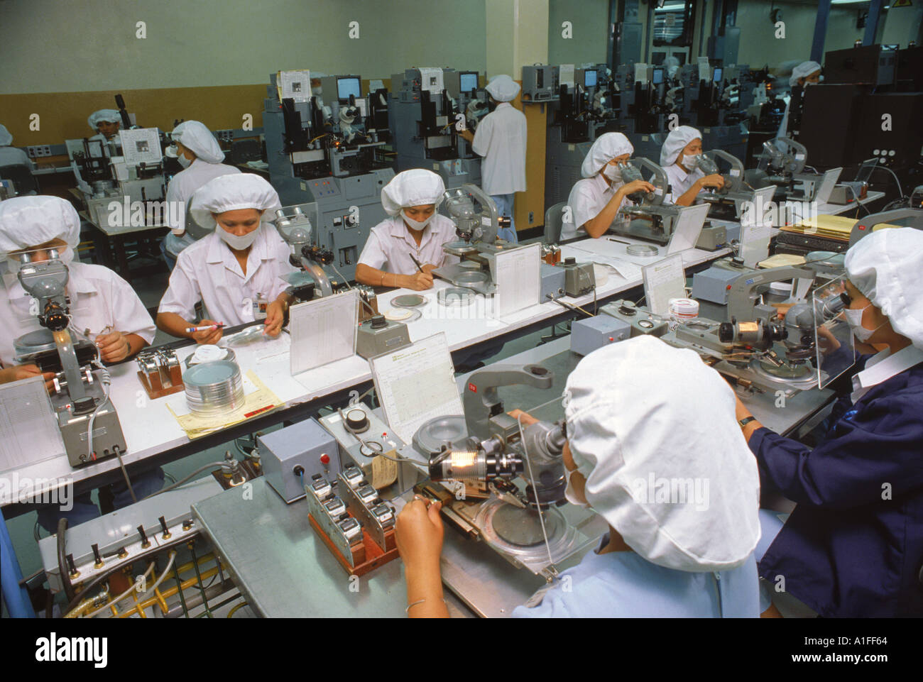 Women in production hi-res stock photography and images - Alamy