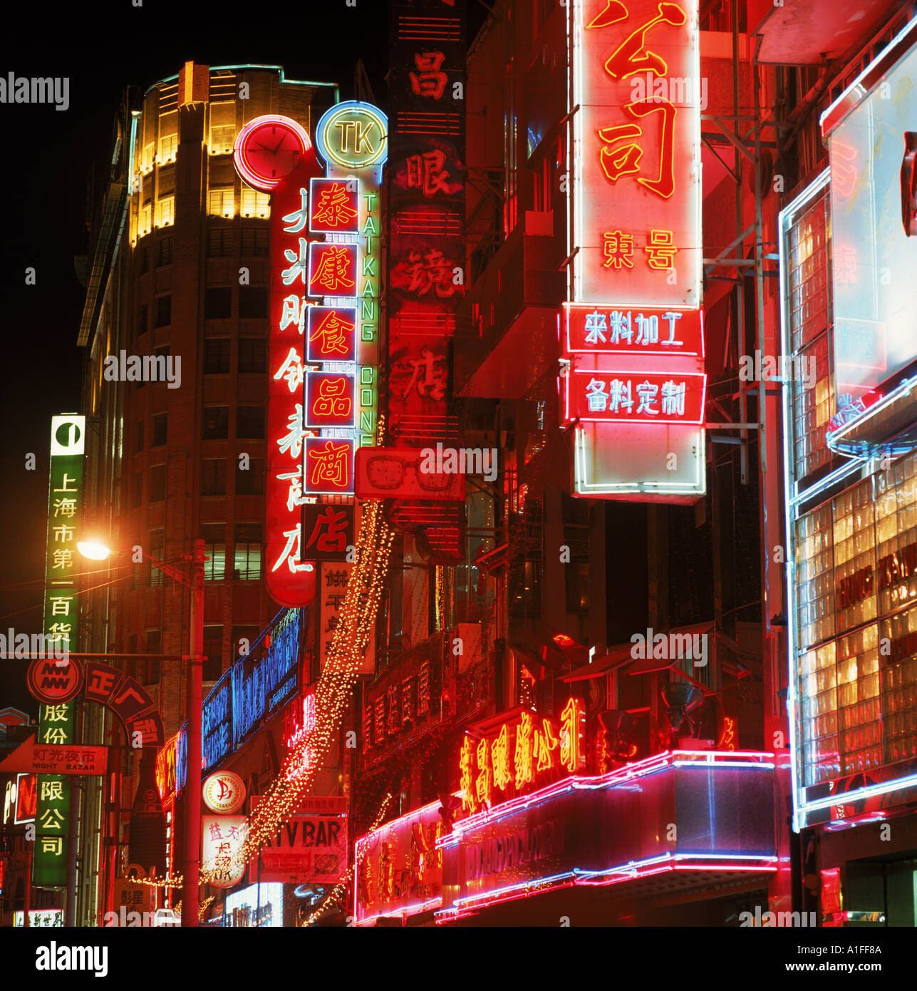 Neon signs illuminated at night in Shanghai China P Van Riel Stock ...