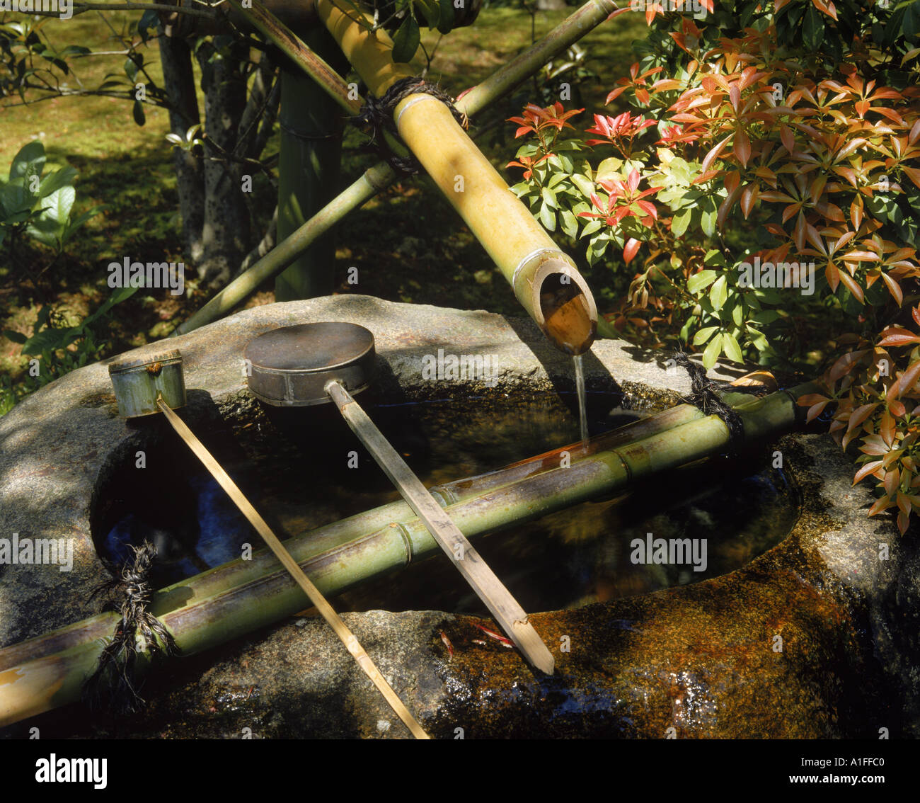 Water fountain in the grounds of a temple in Kyoto Japan Asia G Hellier ...