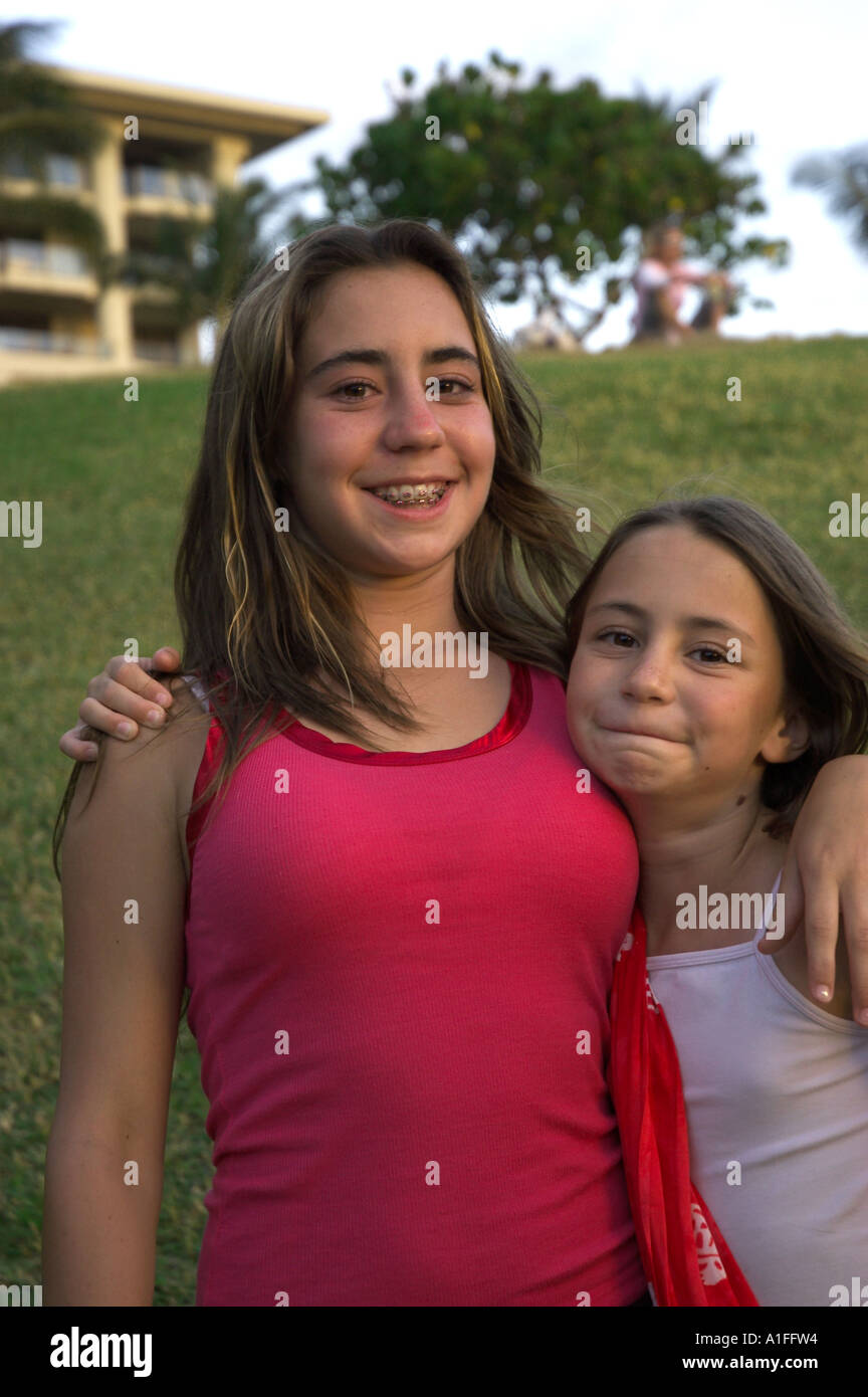 Caucasian sisters embracing hi-res stock photography and images - Alamy