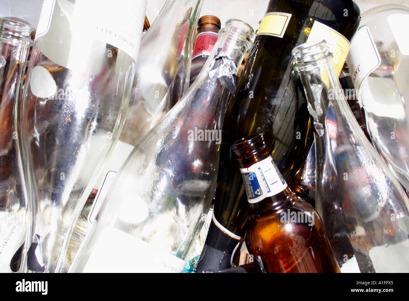 A COLLECTION OF EMPTY BEER AND WINE BOTTLES LEFT AFTER A PARTY Stock ...