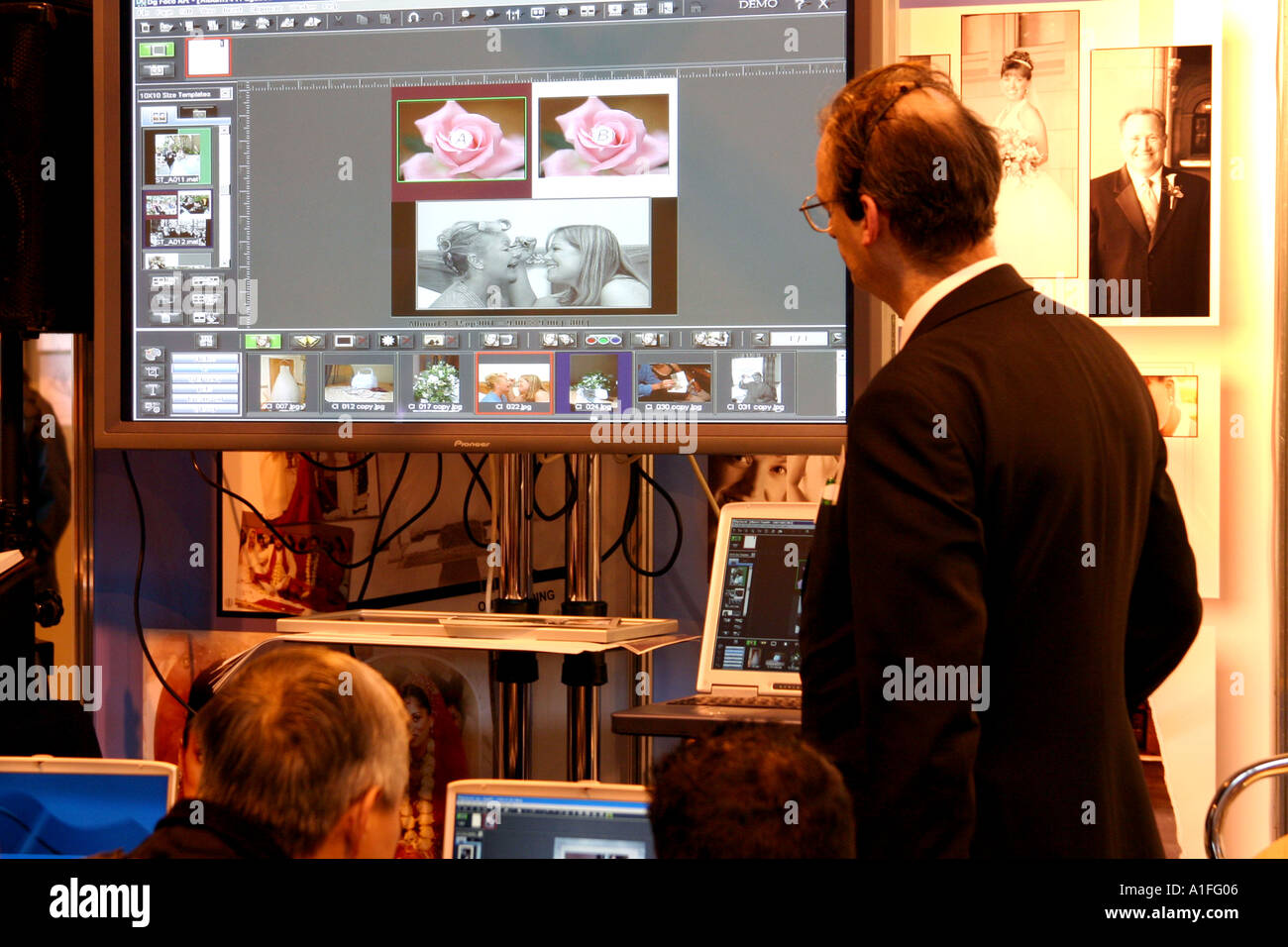 Viewing a computer screen business man hi-res stock photography and ...