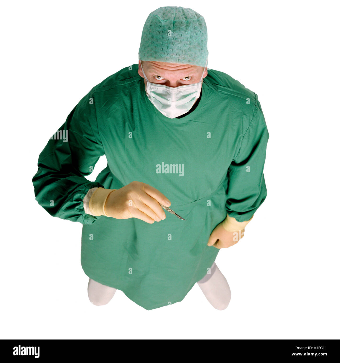 Surgeon holding scalpel Stock Photo - Alamy