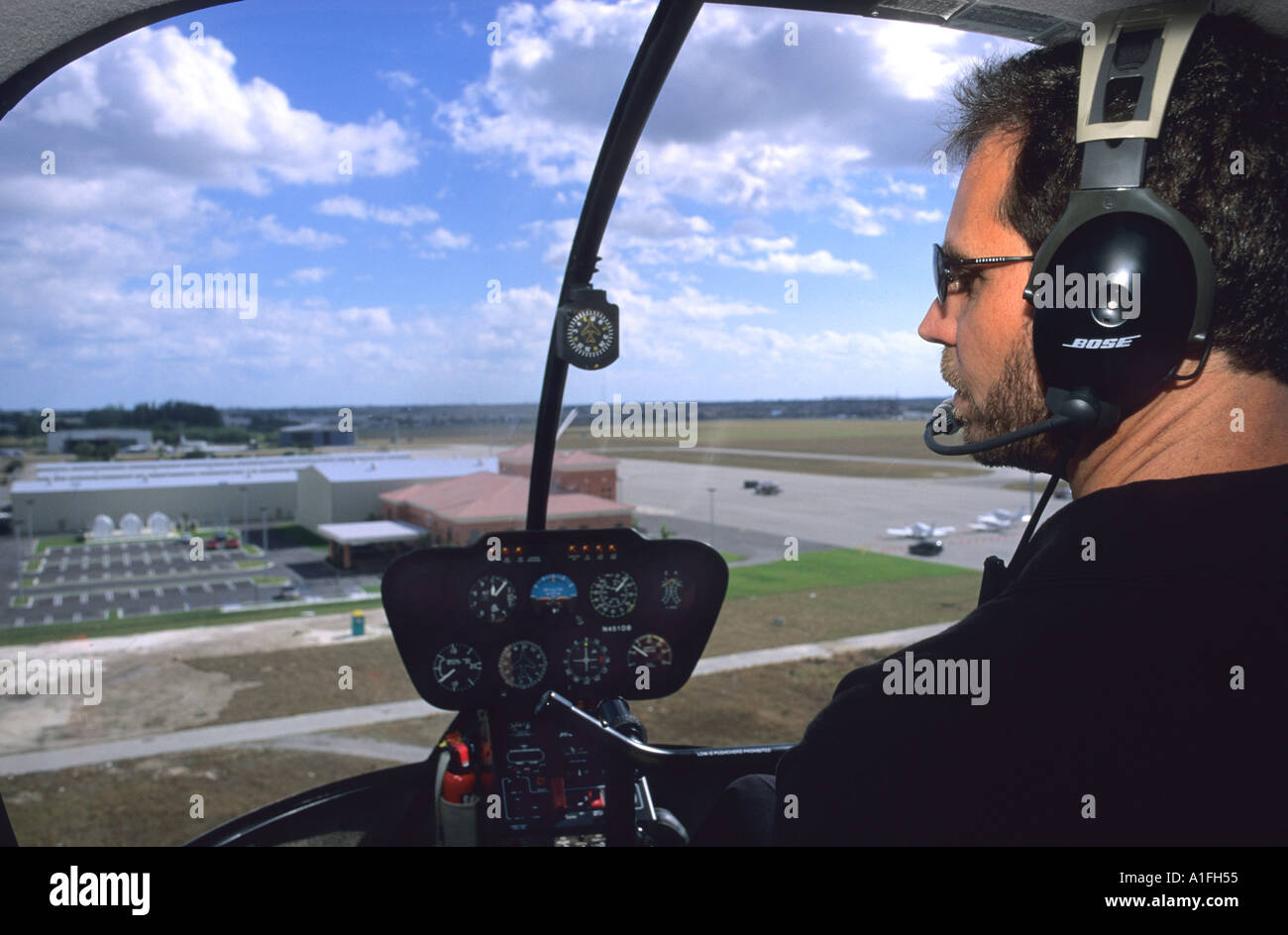 A helicopter pilot in Miami Florida Stock Photo - Alamy