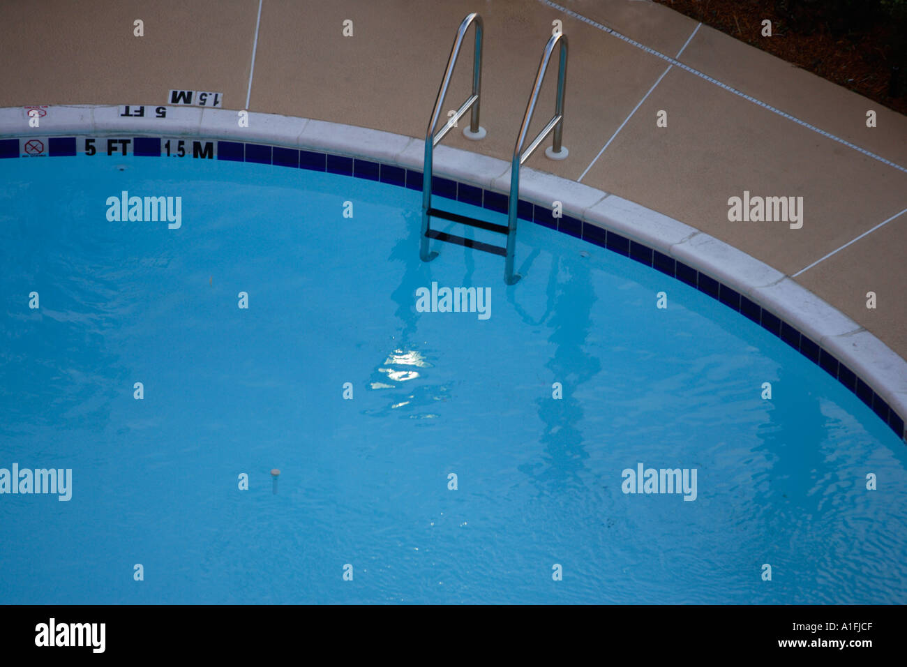 Ladder going into a pool Stock Photo - Alamy