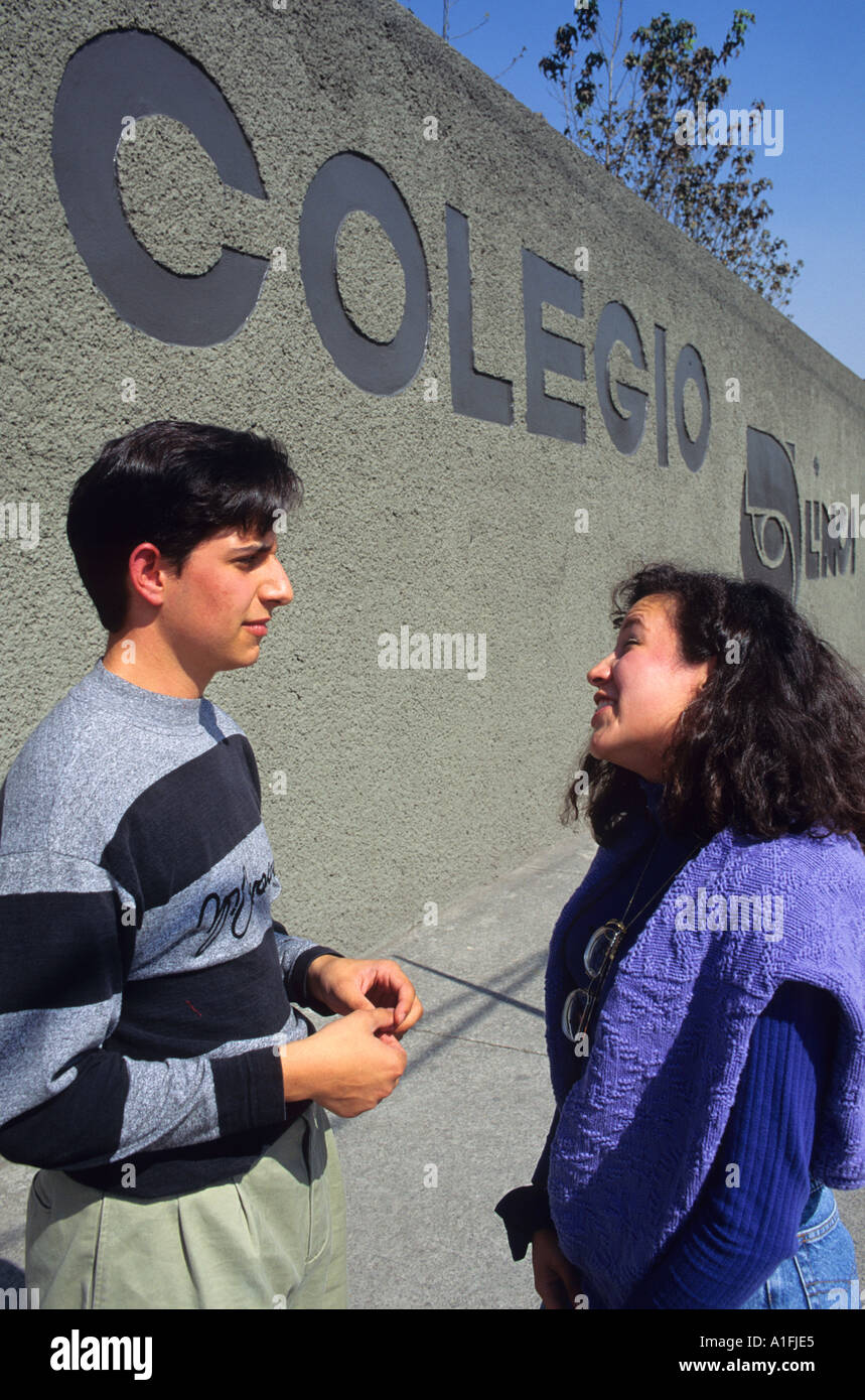 Mexican high school students talking outside school in Mexico City ...