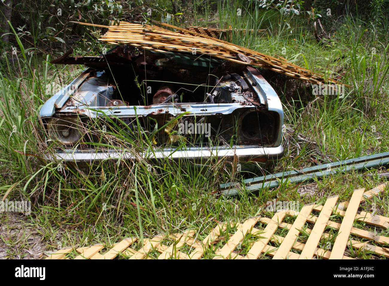 DUMPED TRASHED MOTOR VEHICLE IN THE BUSH Stock Photo - Alamy