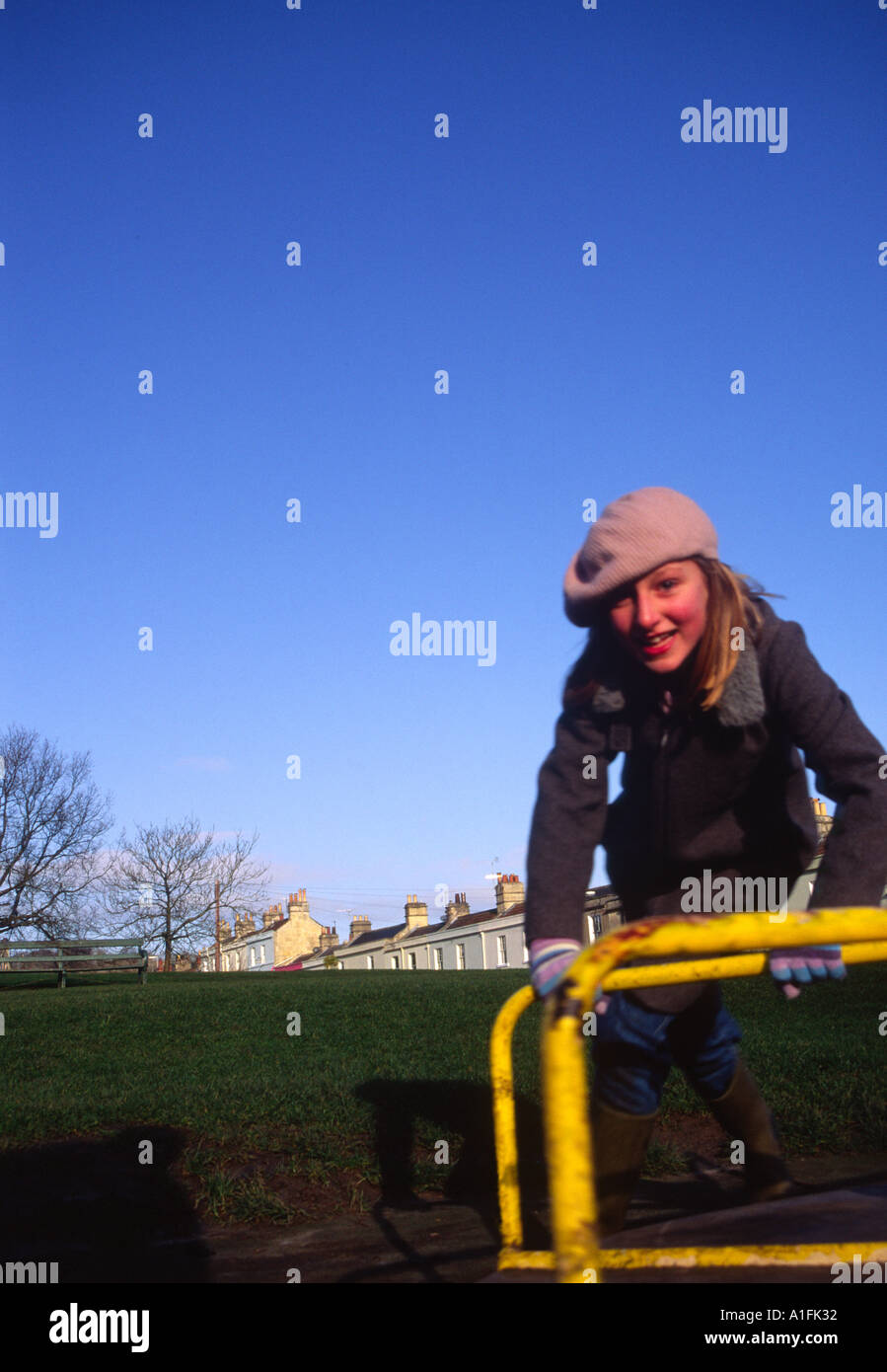 Girl roundabout in playground childhood hi-res stock photography and ...