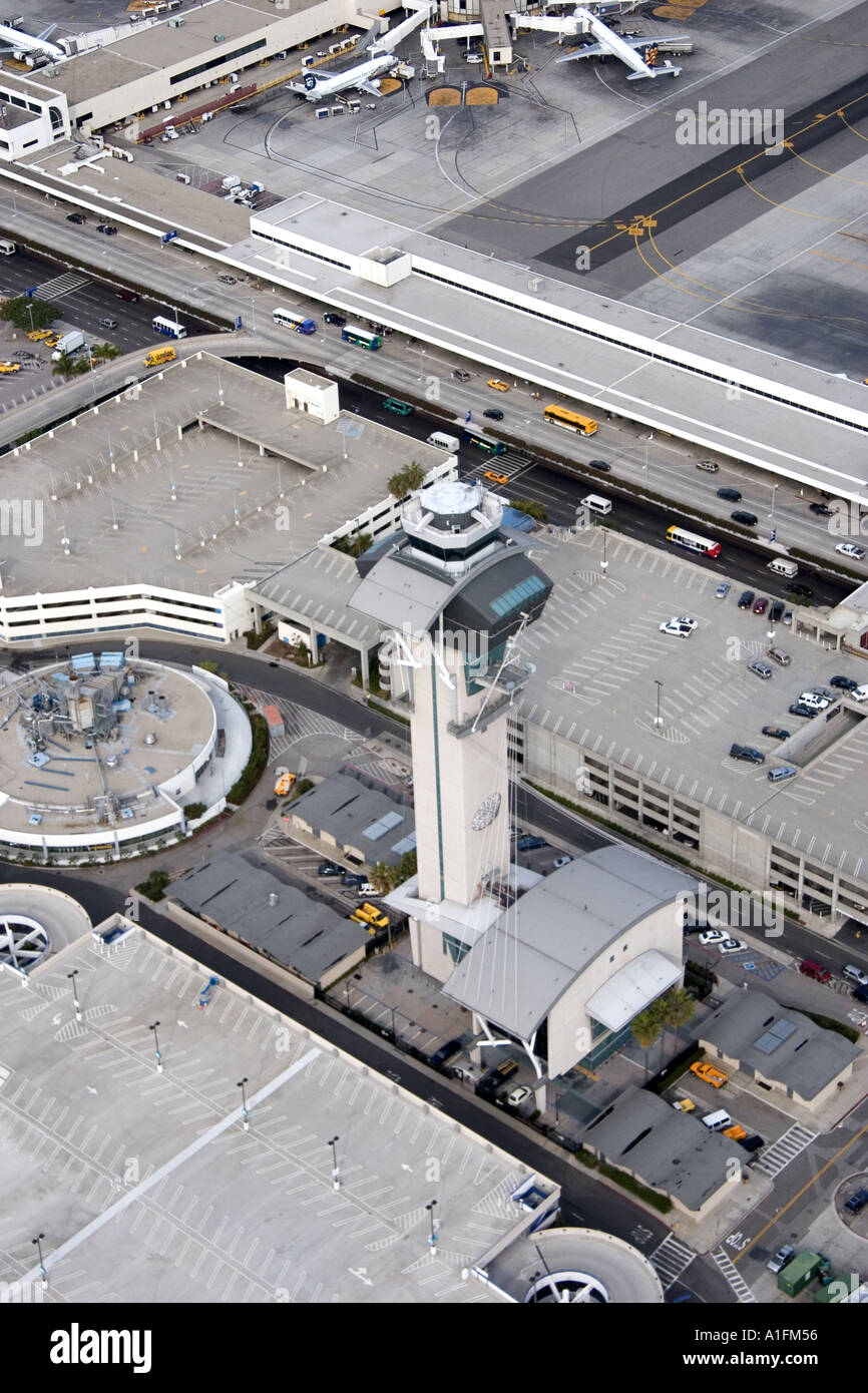 Aerial image of airplanes and traffic control tower at LAX airport Los ...