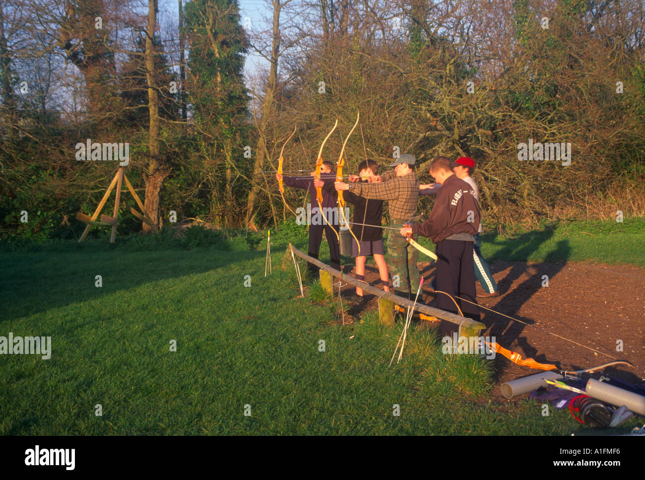 Archery practice on school outdoor activity fieldtrip Stock Photo - Alamy