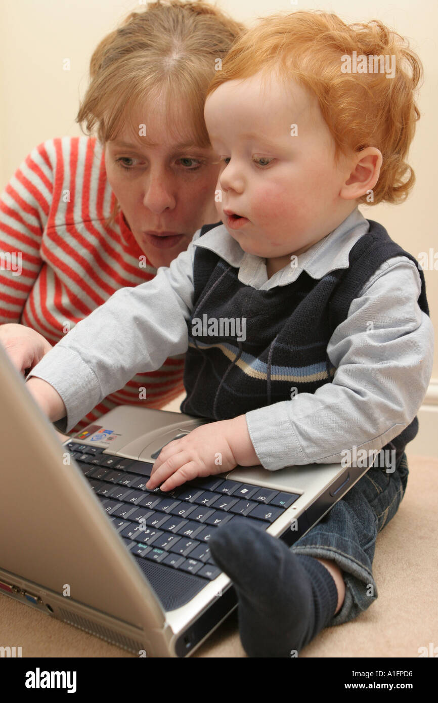 Mother entertaining toddler son hi-res stock photography and images - Alamy
