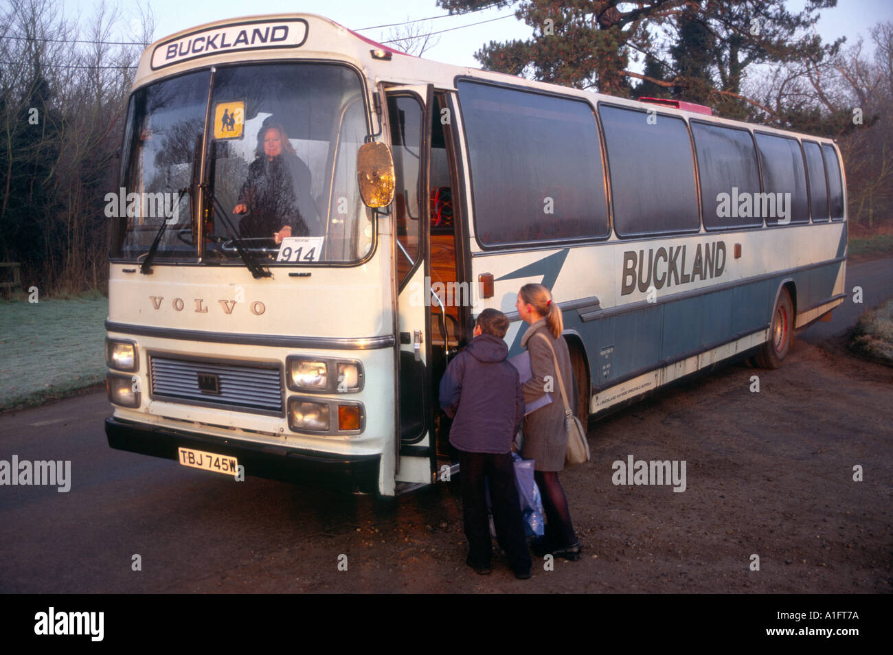 Children boarding country bus to school Suffolk England Stock Photo - Alamy