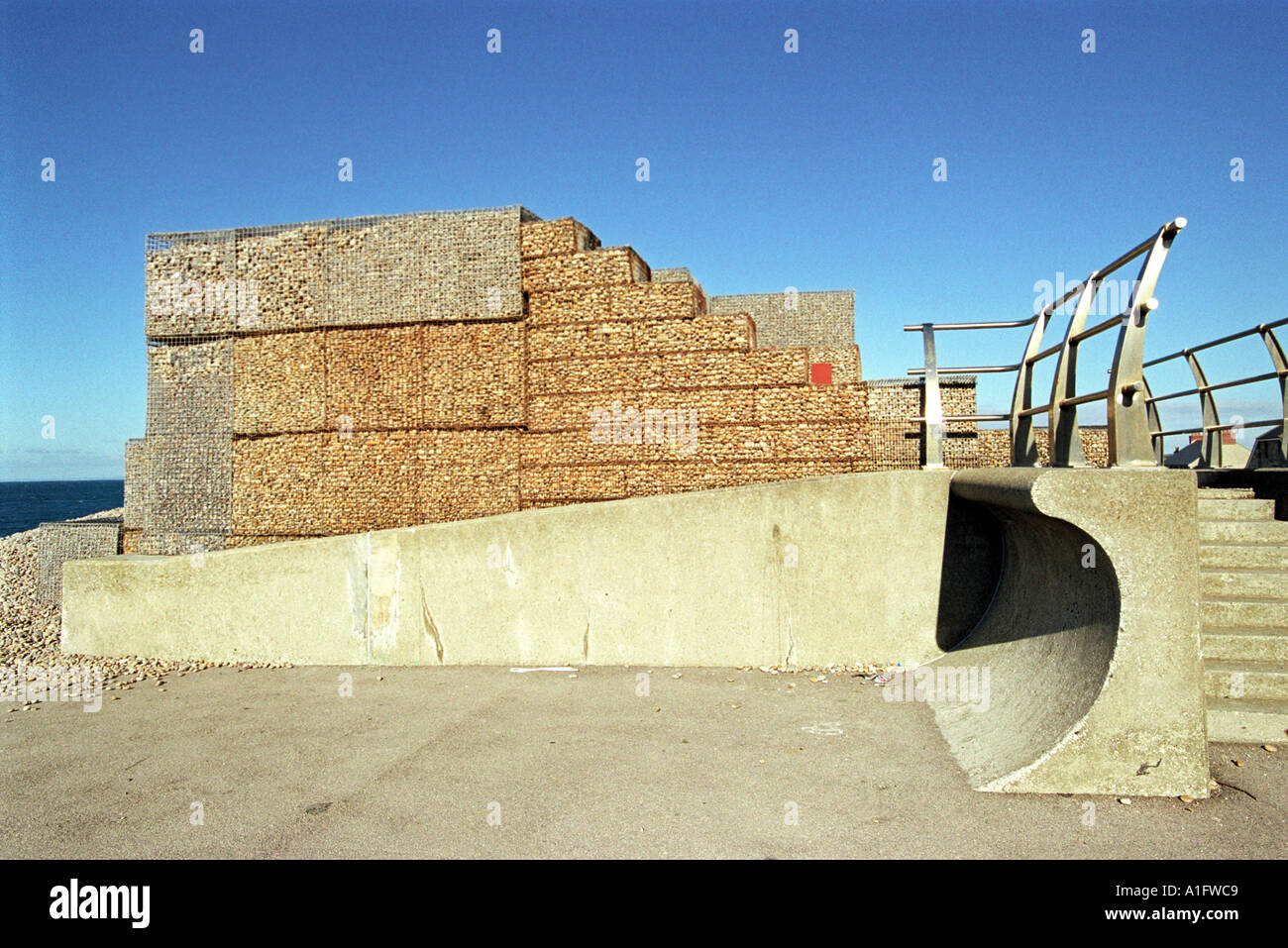 Beach defence wall at Chesil Beach in Dorset Britain UK Stock Photo - Alamy
