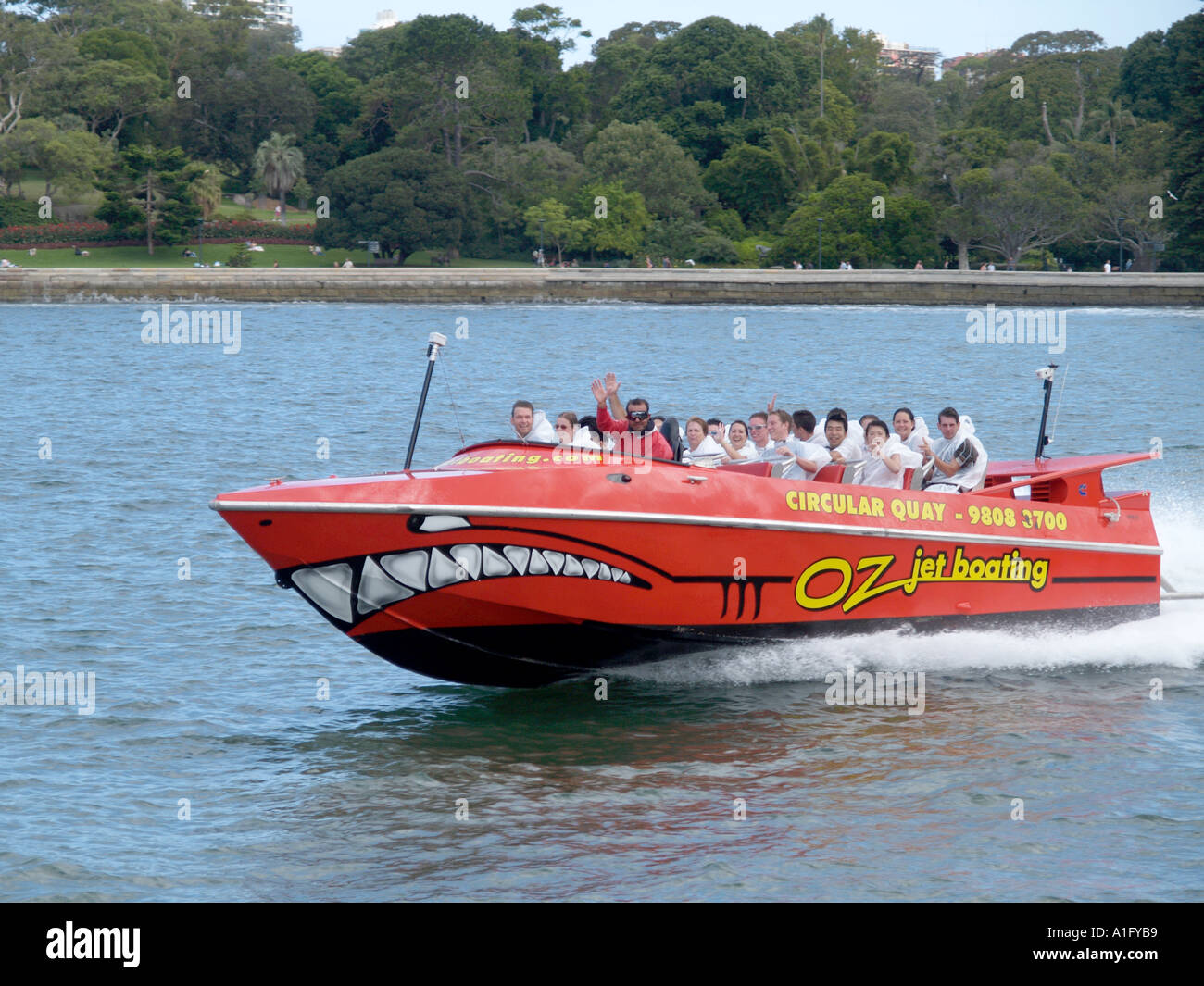 JET BOAT WITH PASSENGERS AT SPEED IN FARM COVE NEAR SYDNEY HARBOUR ...