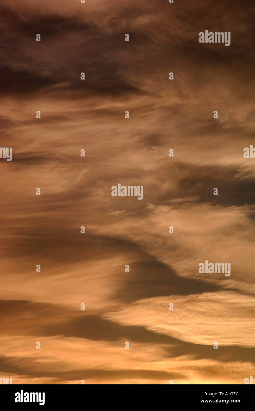 Natural Evening Sky With Warm Coloured Clouds Stock Photo - Alamy