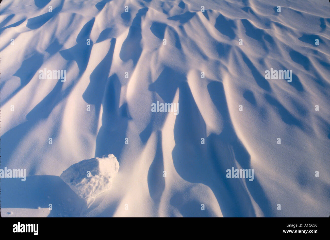 Windblown Patterns In Snow Stock Photo - Alamy