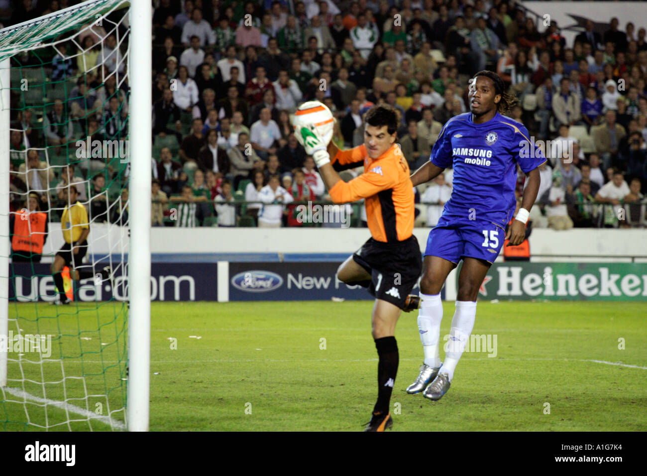 Contreras, Real Betis goalkeeper, catchs ball in front of Drogba ...