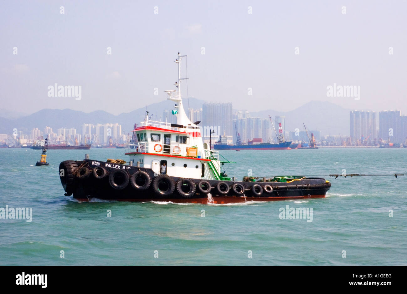 Stock photograph of a tug boat on Victoria Harbour in Hong Kong 2006 ...