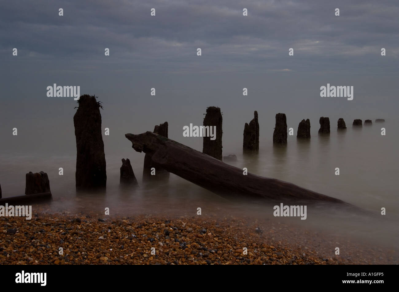 Wooden Groynes in East Sussex UK Stock Photo - Alamy