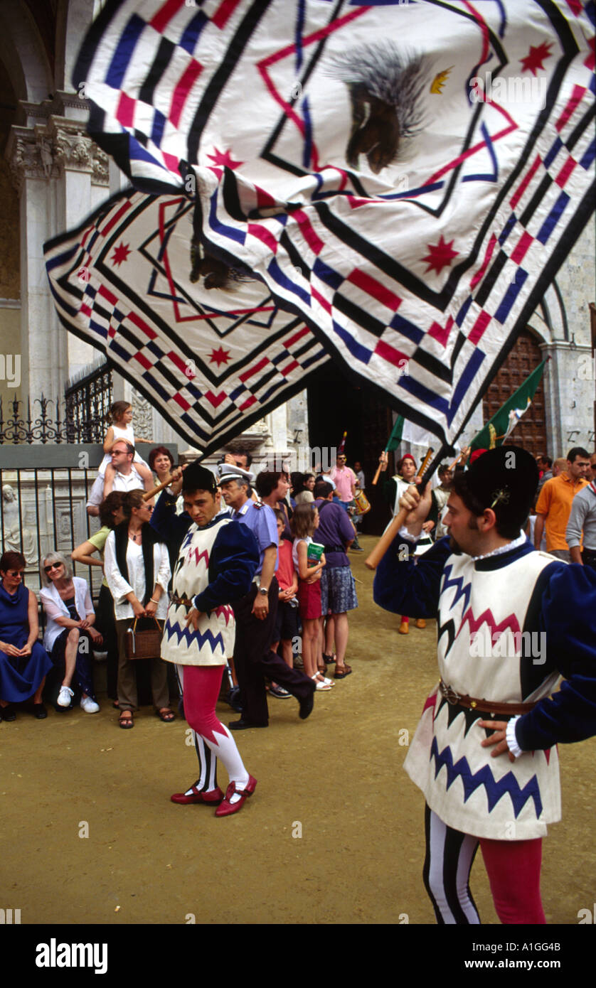 Contrada Istrice members with their flag on street parade during Il ...
