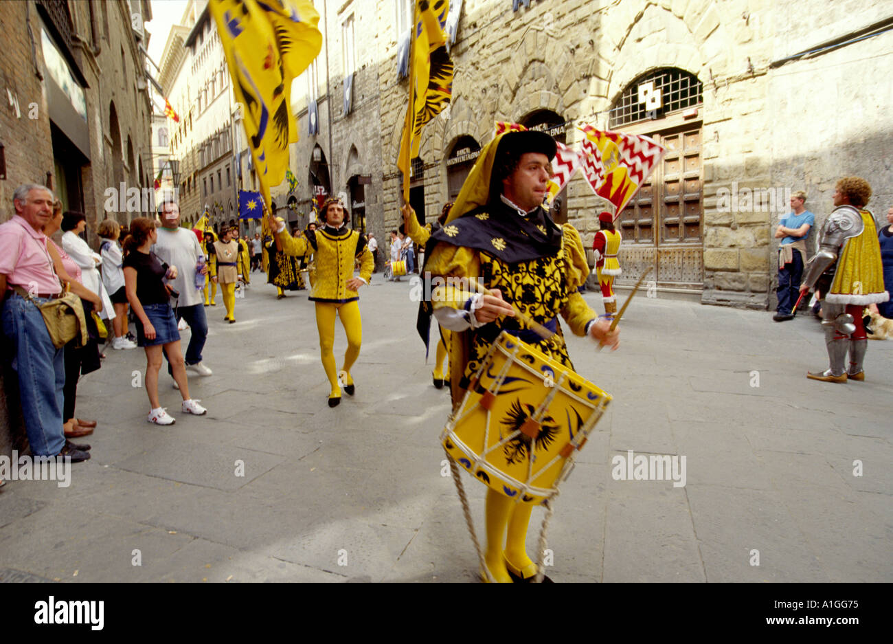 Contrada Aquila members in costumes on street parade during Il Palio ...