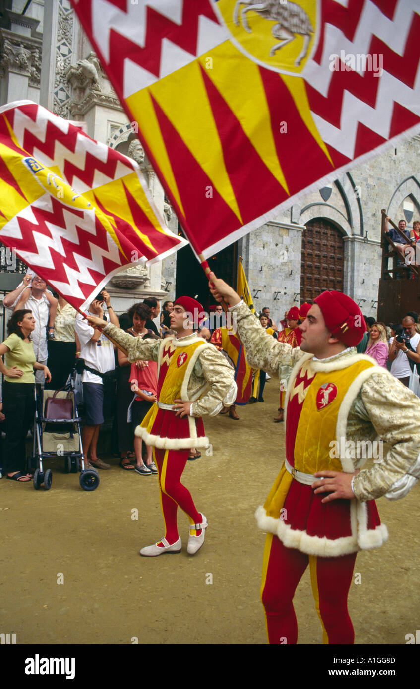 Contrada Valdimontone members with their flag on street parade during ...