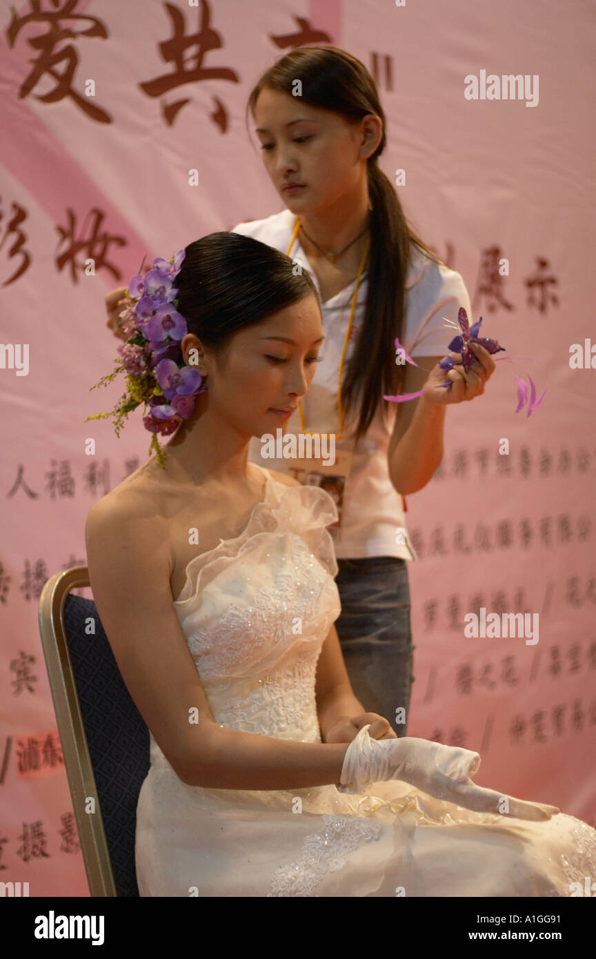 chinese girl in wedding dress getting made up in shanghai china as part ...