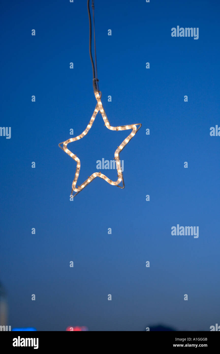 Hanging Christmas Star Stock Photo - Alamy