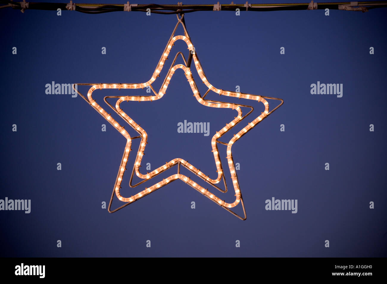 Hanging Christmas Star Stock Photo - Alamy