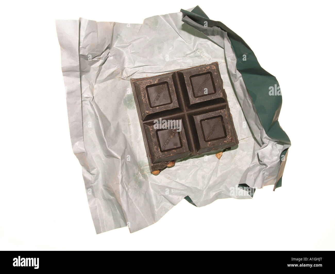 Chocolate with almond slab in silver foil wrapper Stock Photo - Alamy