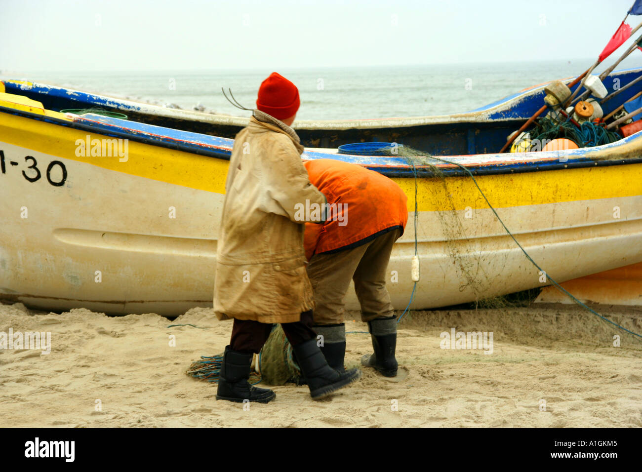 Fishermen at work Stock Photo - Alamy