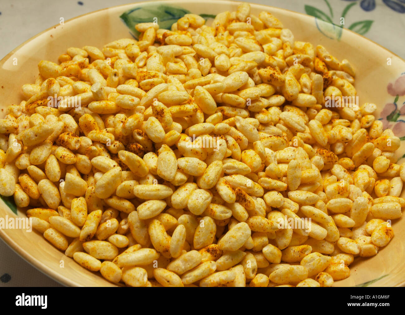 Mumra in bowl Indian dish made with puffed rice and various spices ...