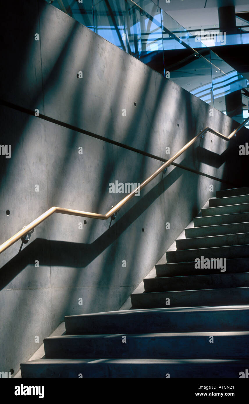 concrete stairs wall and wooden handrail Stock Photo - Alamy