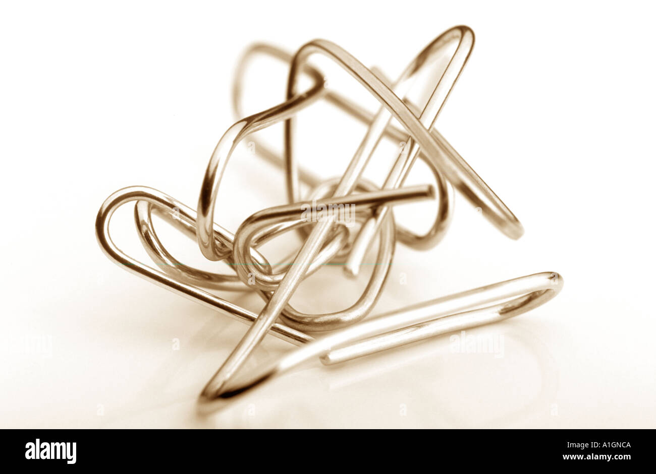 tangled paper clips Stock Photo - Alamy