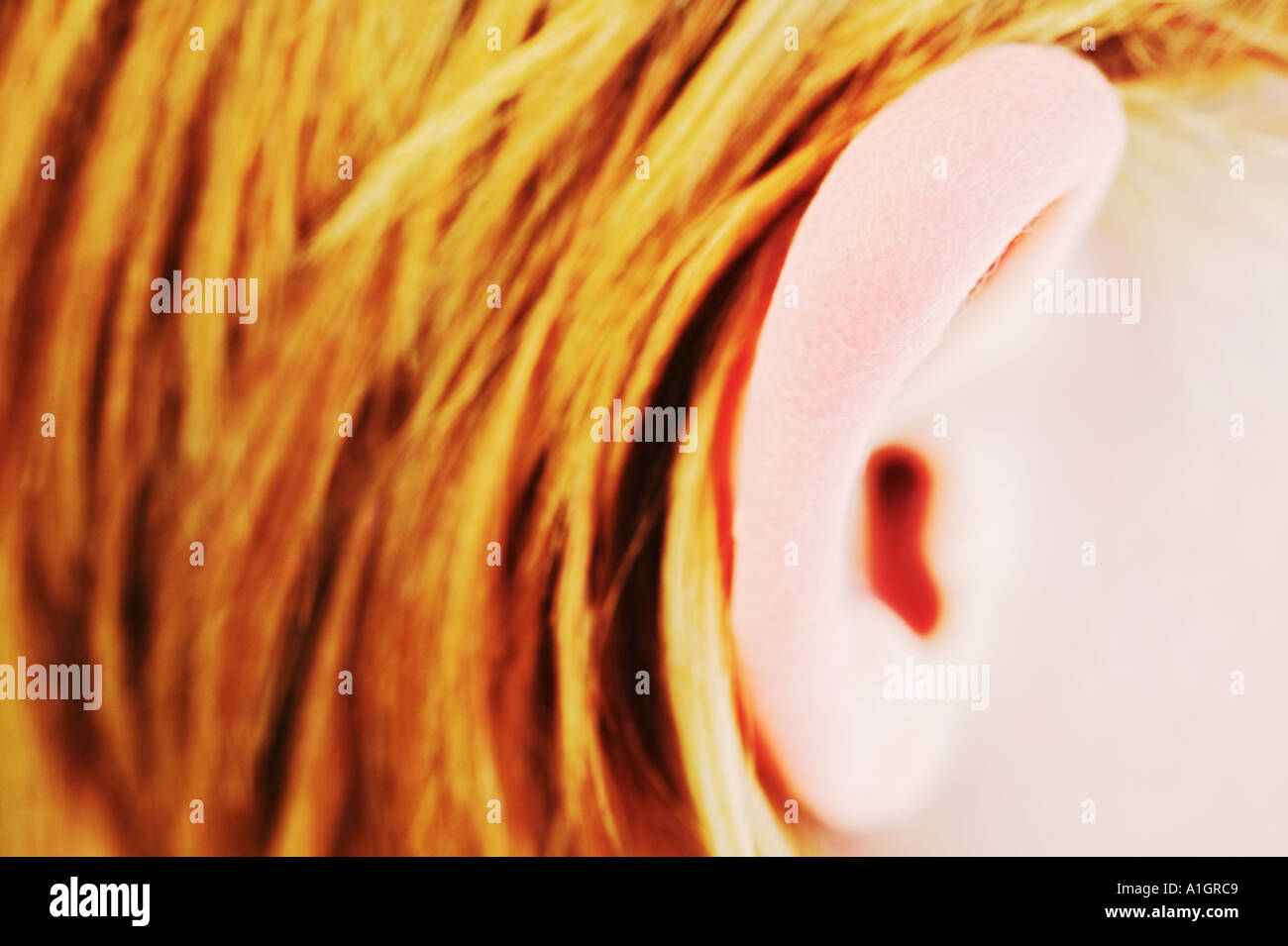 Ear Of Red Haired Girl Stock Photo - Alamy