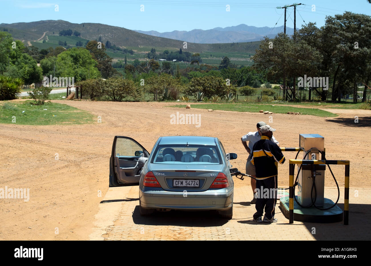 Filling car with fuel at Karoo town of Misgund in the Eastern cape ...