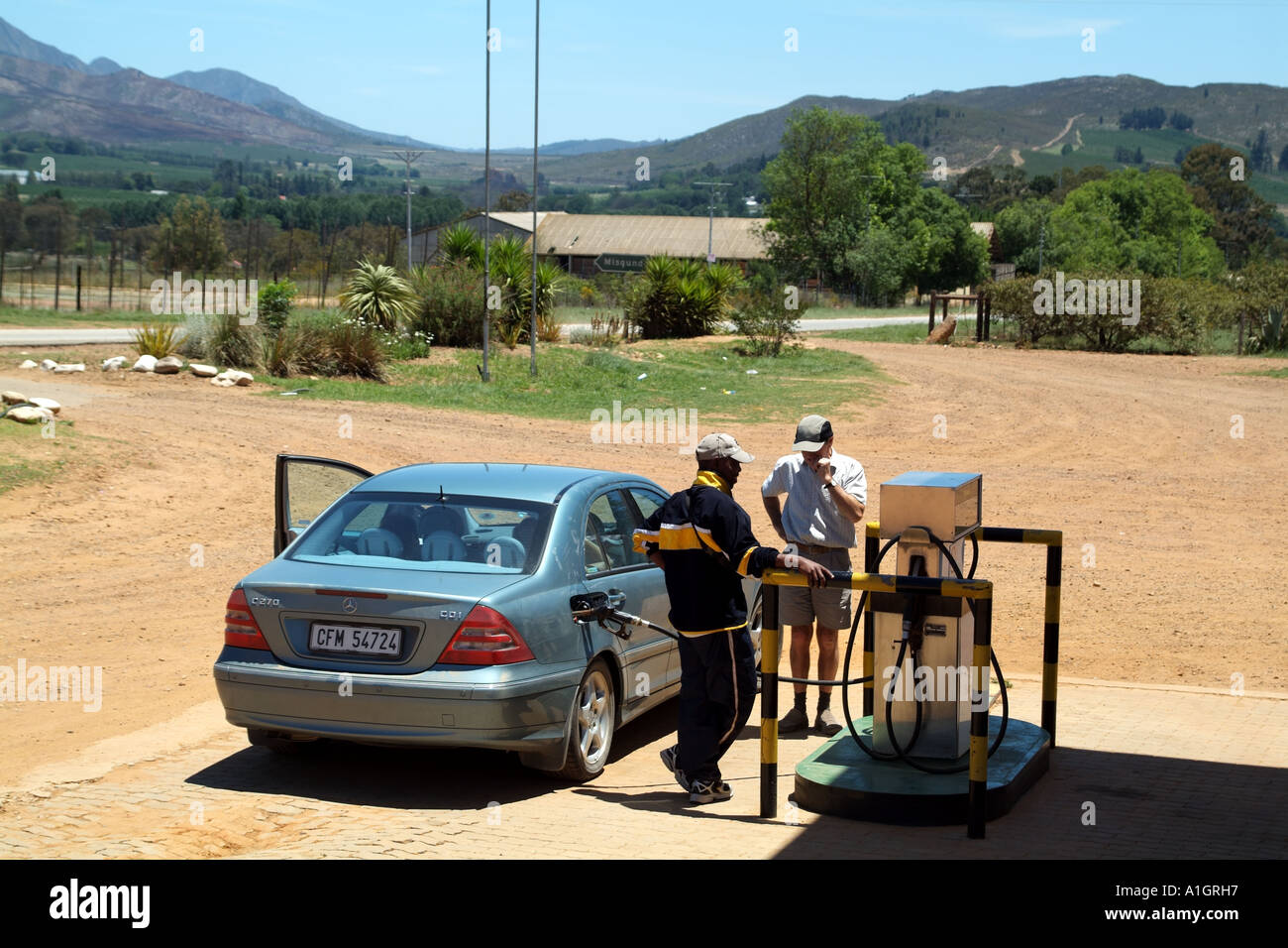 Filling car with fuel at Karoo town of Misgund in the Eastern cape ...