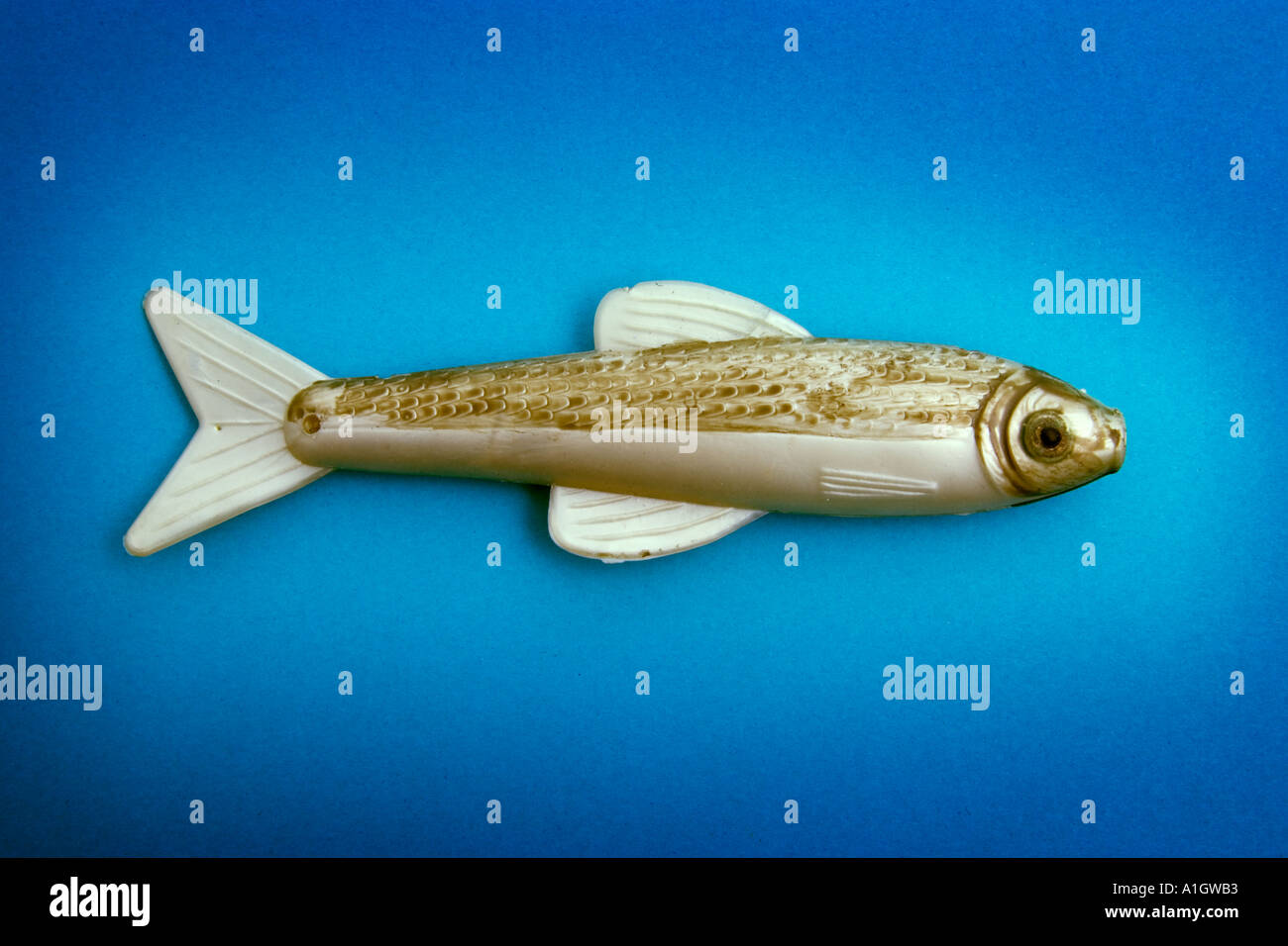 Rubber fish on a bright background Stock Photo - Alamy