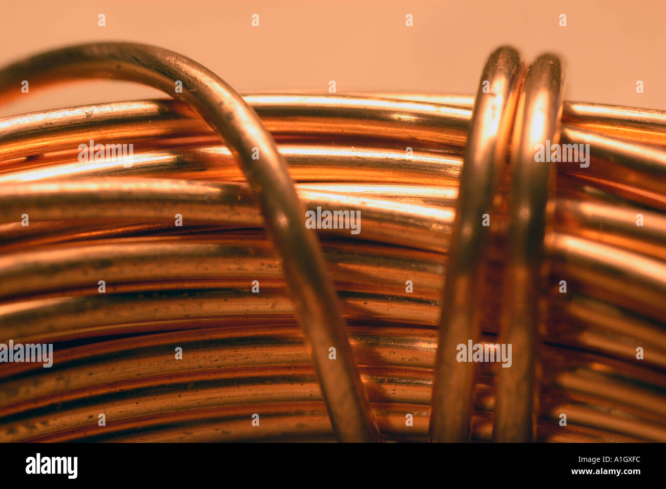 Copper wire coil Stock Photo - Alamy