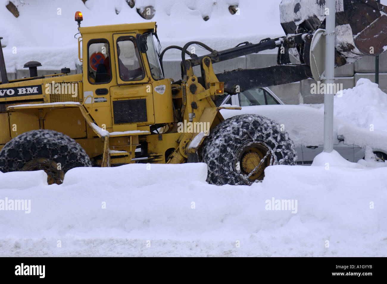 Bulldozer with snow chains hi-res stock photography and images - Alamy