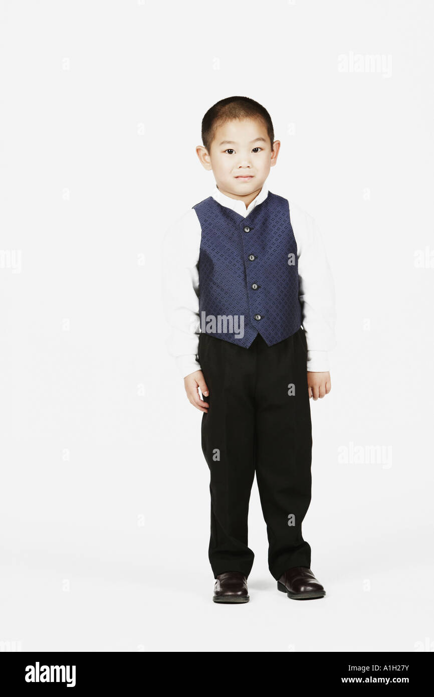 Portrait of a boy looking serious Stock Photo - Alamy