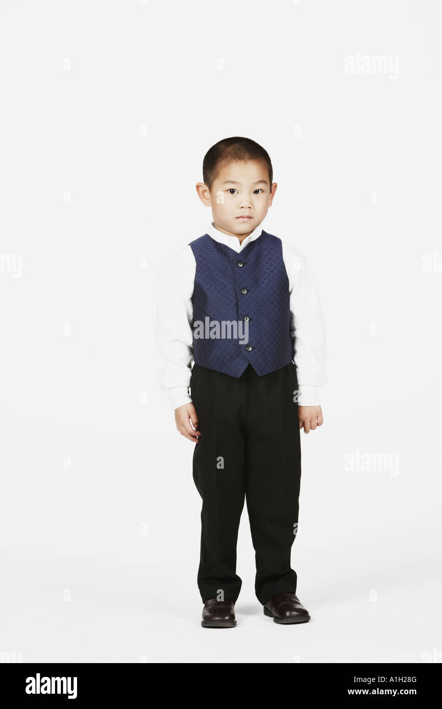 Portrait of a boy looking serious Stock Photo - Alamy